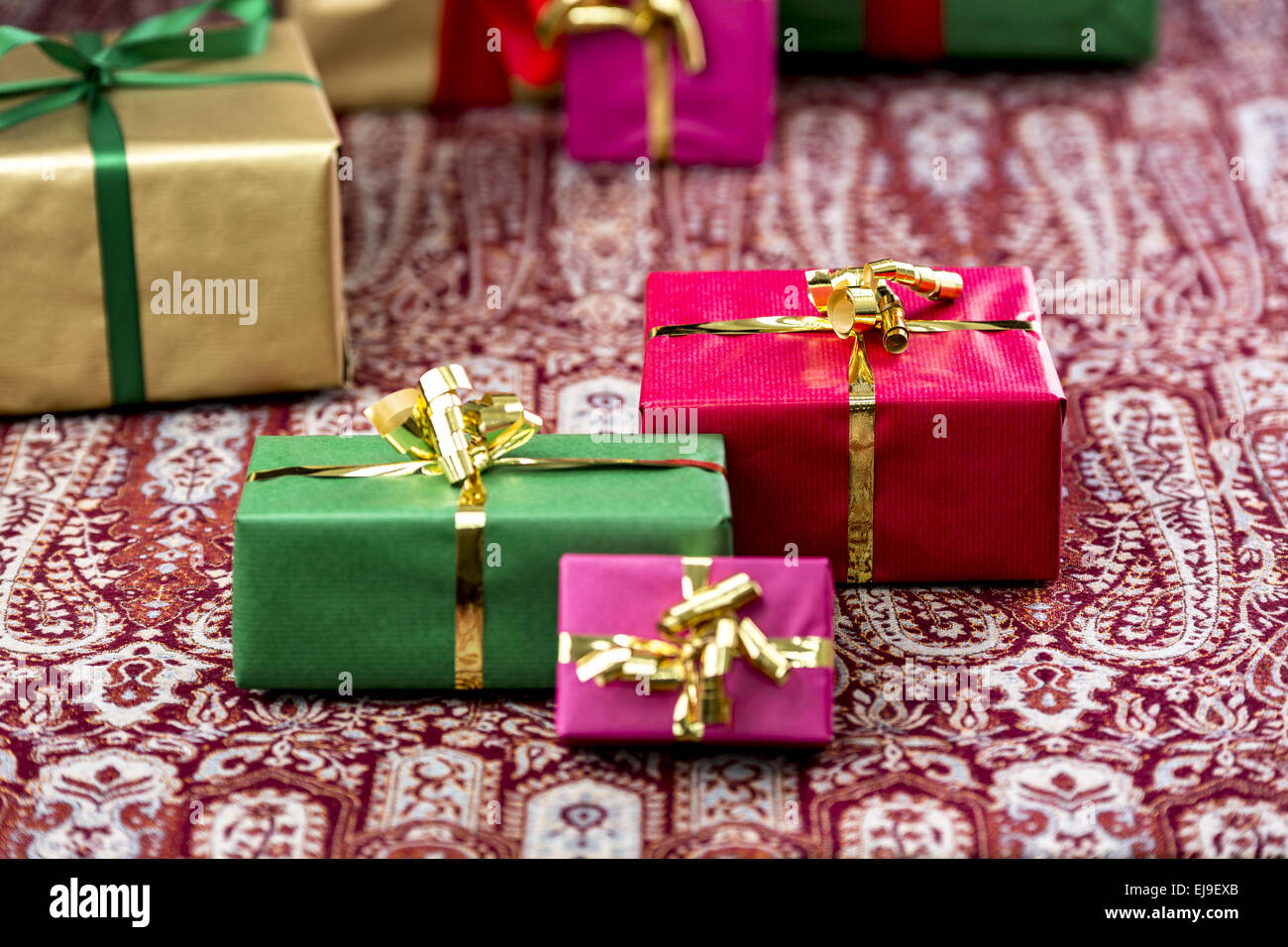 Three Presents Standing Out Stock Photo - Alamy
