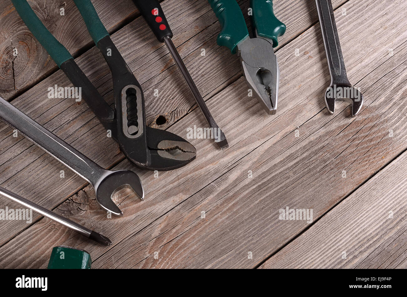 Tools for repair wooden background Stock Photo - Alamy