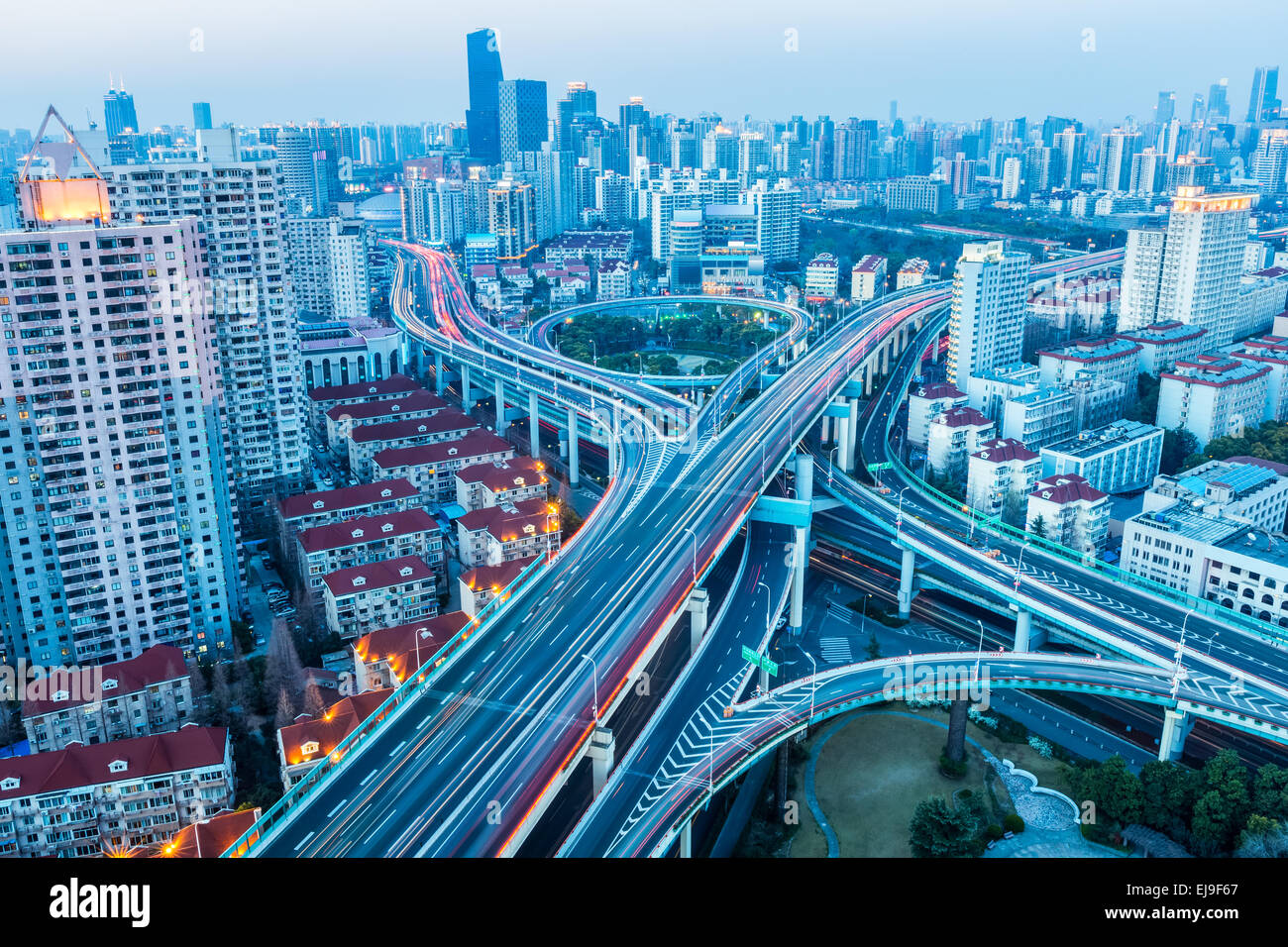 beautiful city interchange in nightfall Stock Photo - Alamy