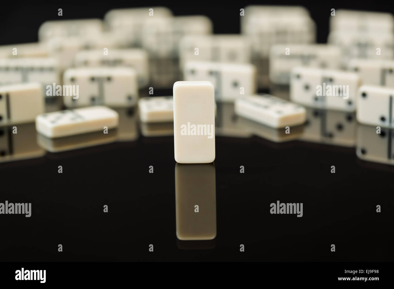 White dominoes with single blank domino Stock Photo - Alamy