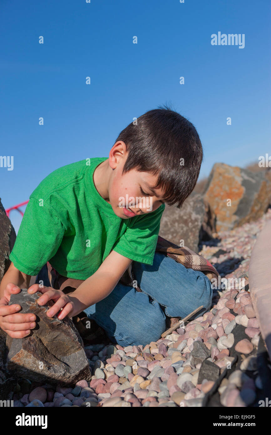Boy under rock hi-res stock photography and images - Alamy