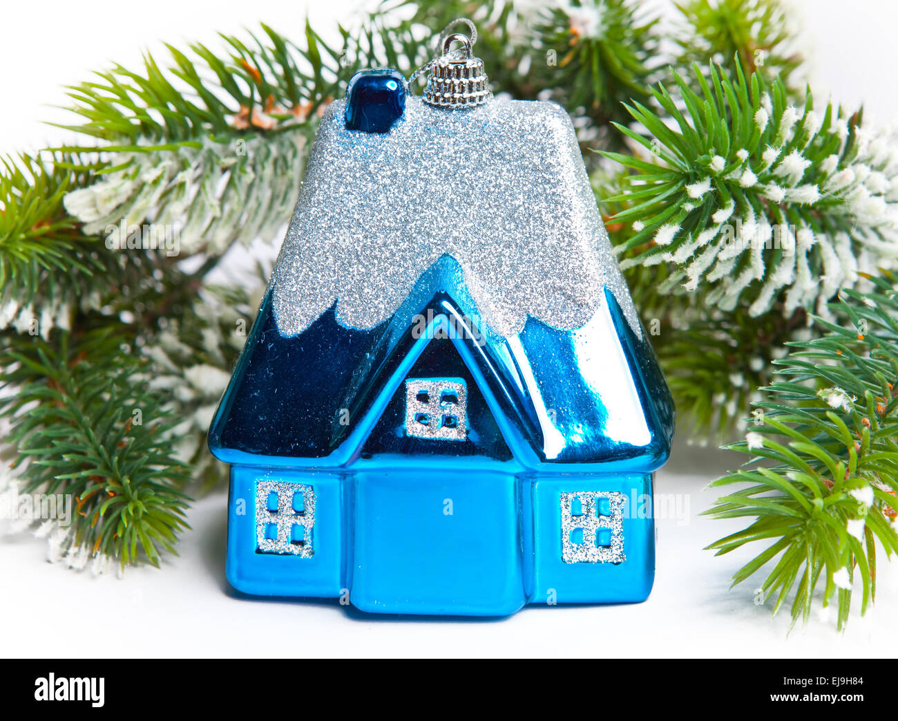 Dark blue New Year's toy small house Stock Photo - Alamy