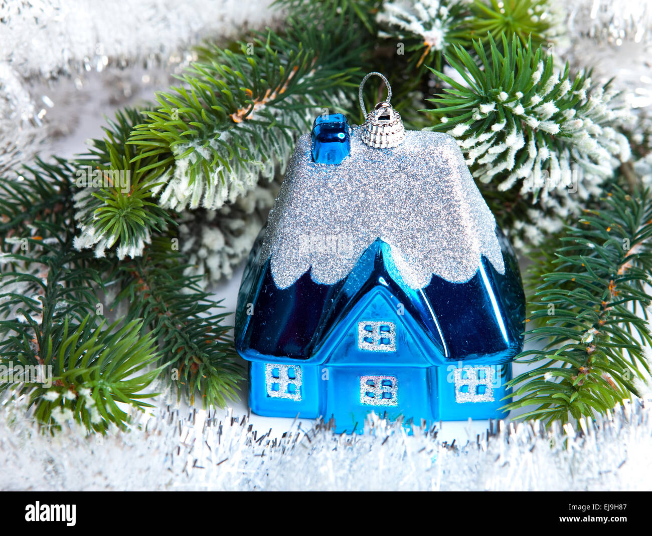 Dark blue New Year's toy small house Stock Photo - Alamy