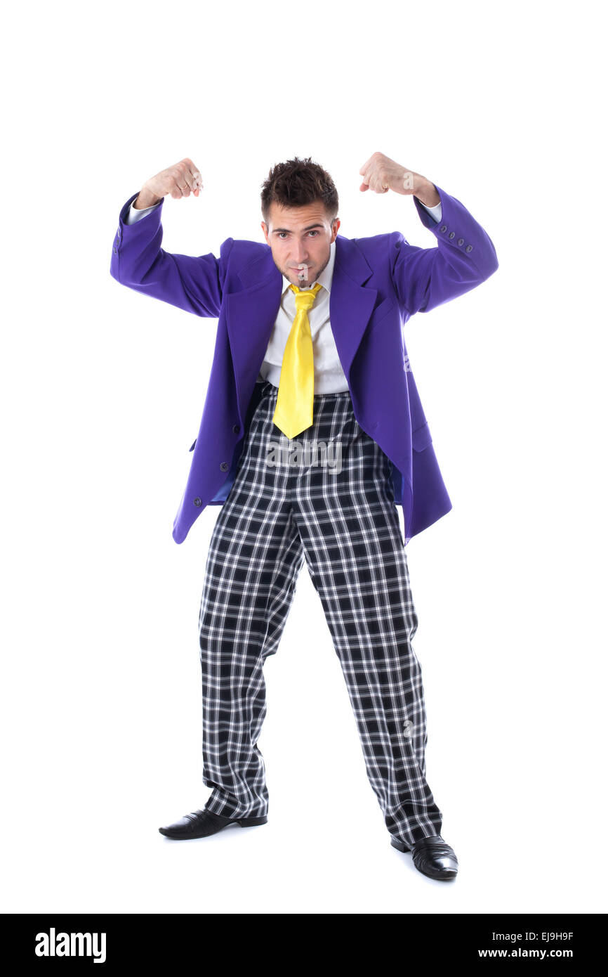 Funny man in large suit posing at camera Stock Photo - Alamy