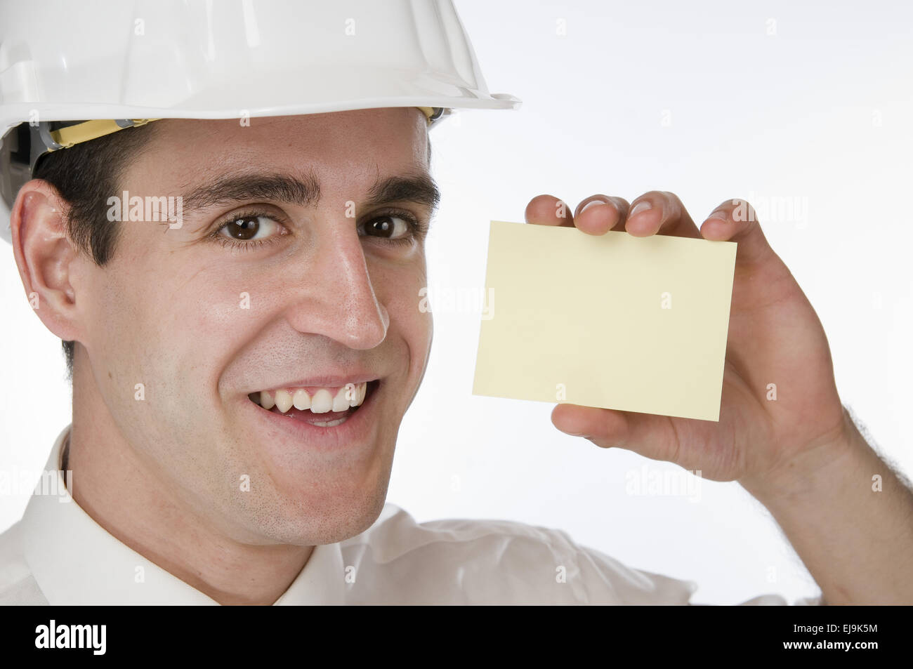 smiling with empty small card Stock Photo - Alamy