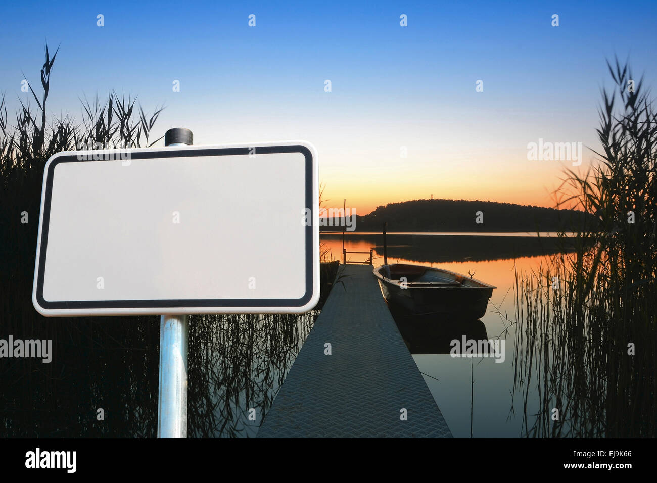 blank sign on a lake Stock Photo - Alamy
