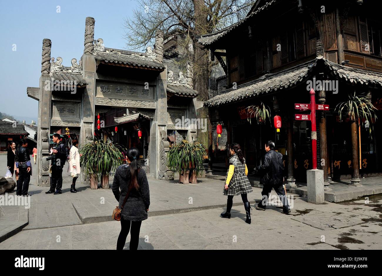 Jie Zi Ancient Town, China: Ornate carved stone ceremonial entry gate ...