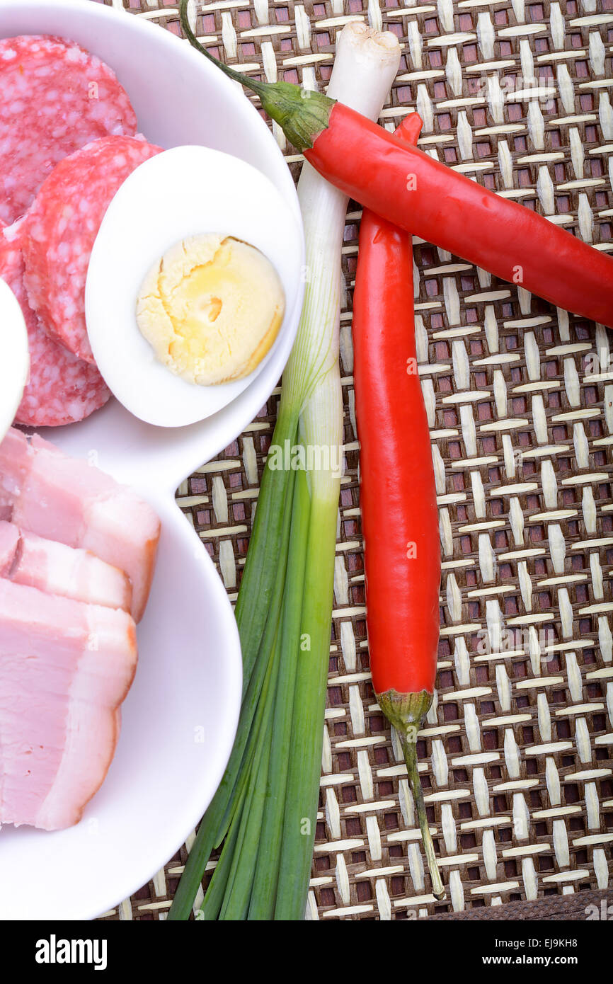 salami with pieces of cheese and red pepper Stock Photo - Alamy