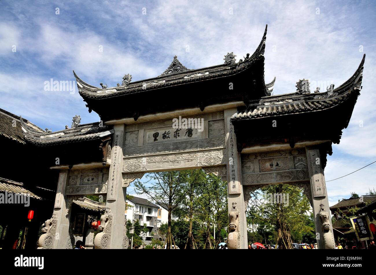 Jie Zi Ancient Town, China: Ceremonial gate with flying eaved roofs and ...