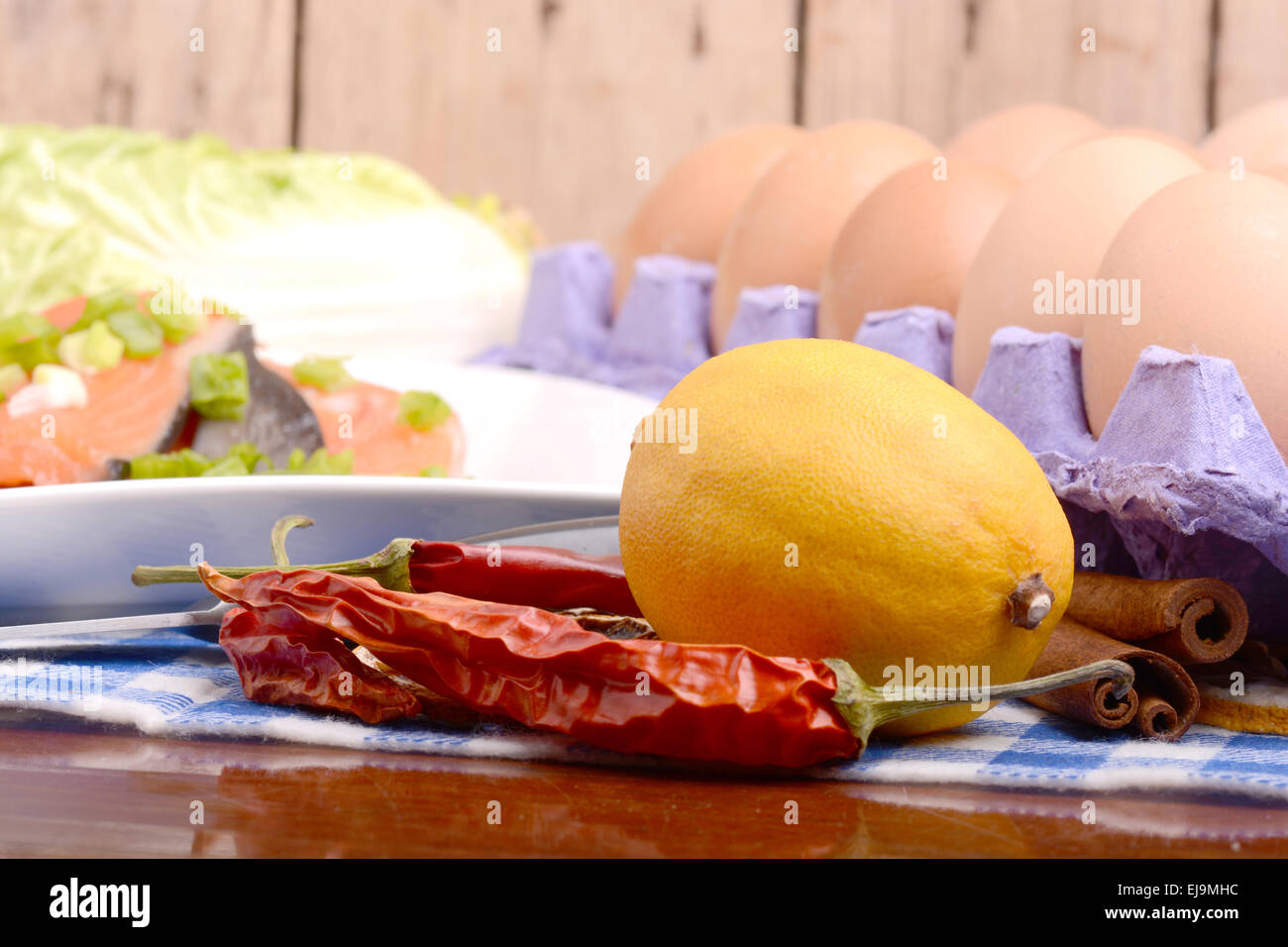 lemon, eggs, red fish, cabbage and red pepper Stock Photo - Alamy