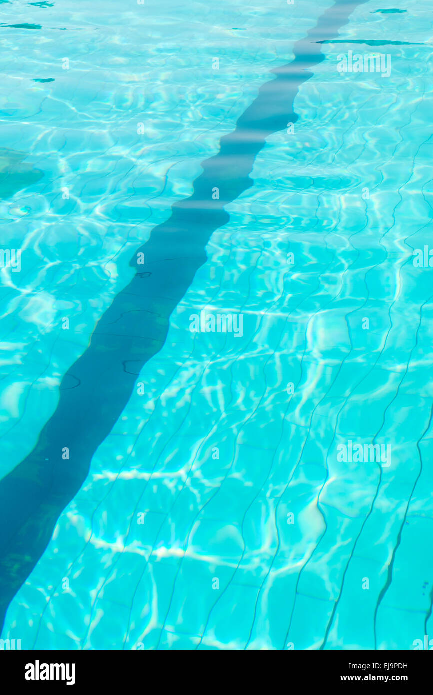 Swimming pool full of light blue water Stock Photo - Alamy