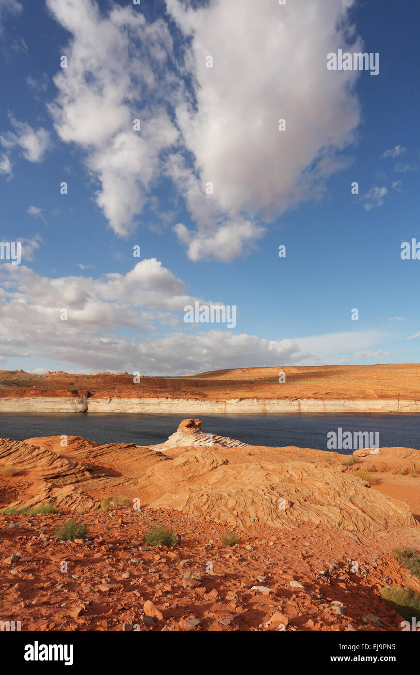 Red stone desert and the blue water Stock Photo - Alamy