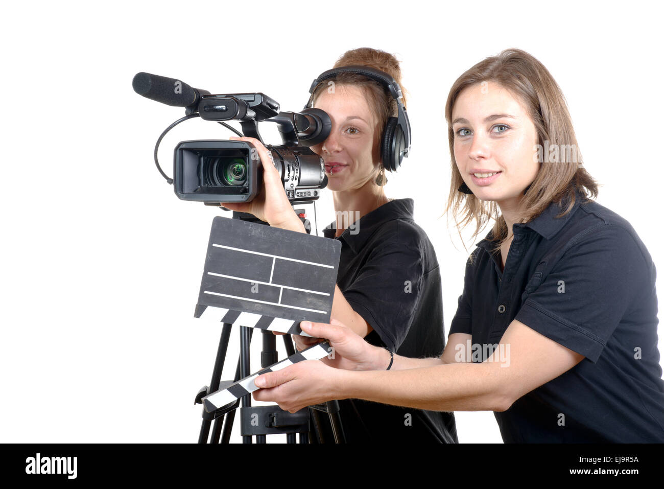 two young women with camera on white Stock Photo - Alamy