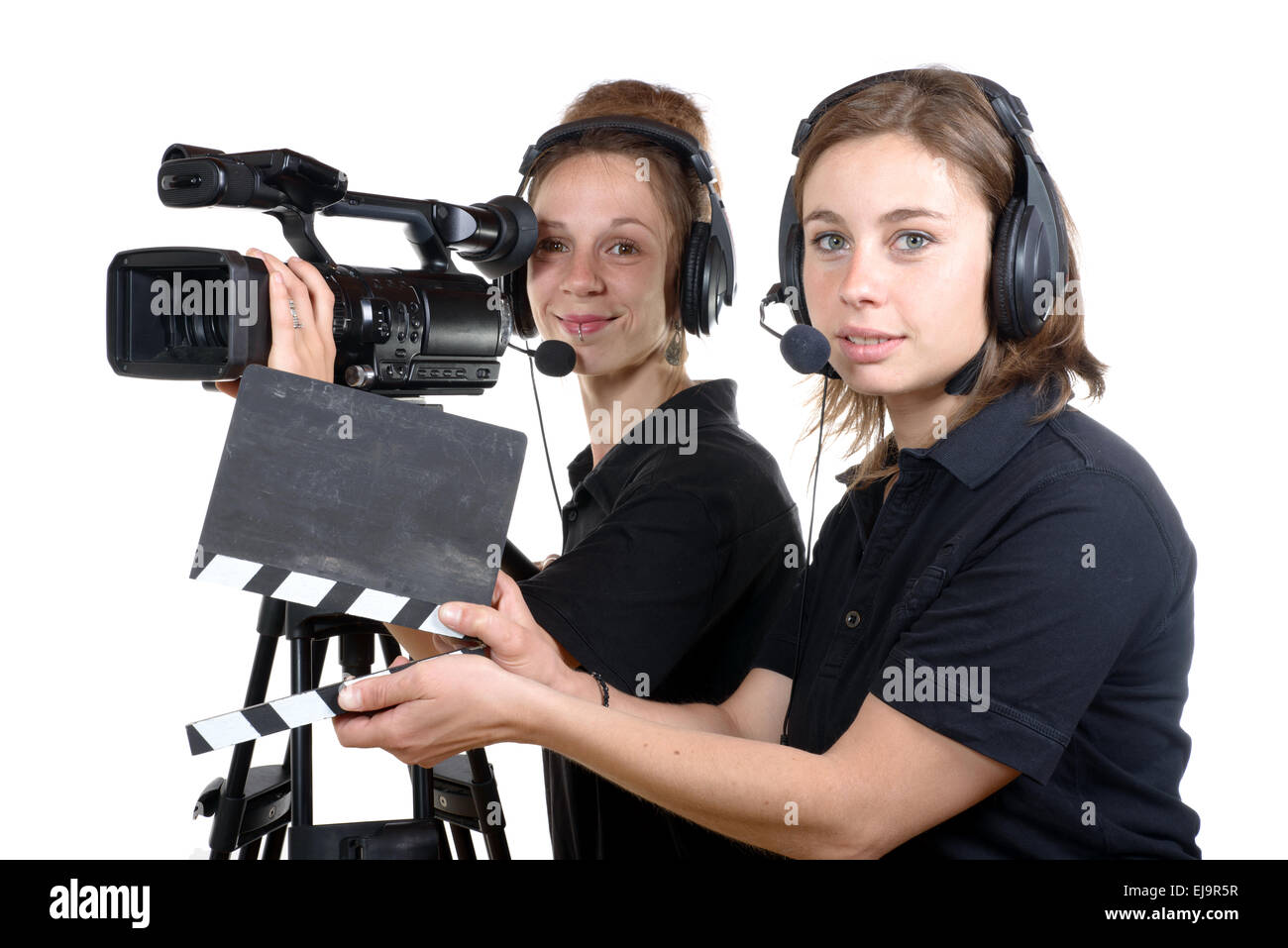 two young women with camera on white Stock Photo - Alamy