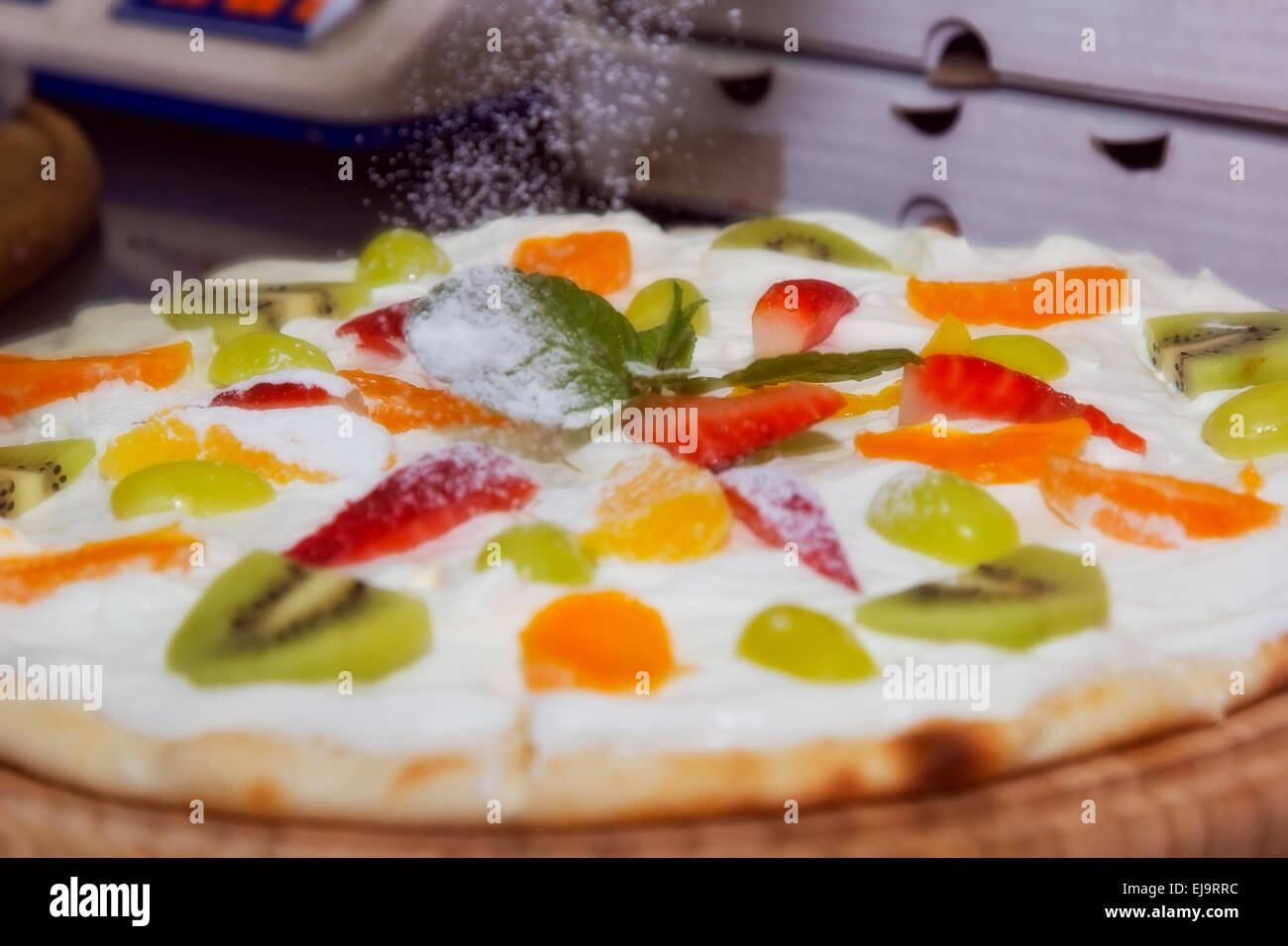 sweet pizza with fruit. Italian food Stock Photo - Alamy