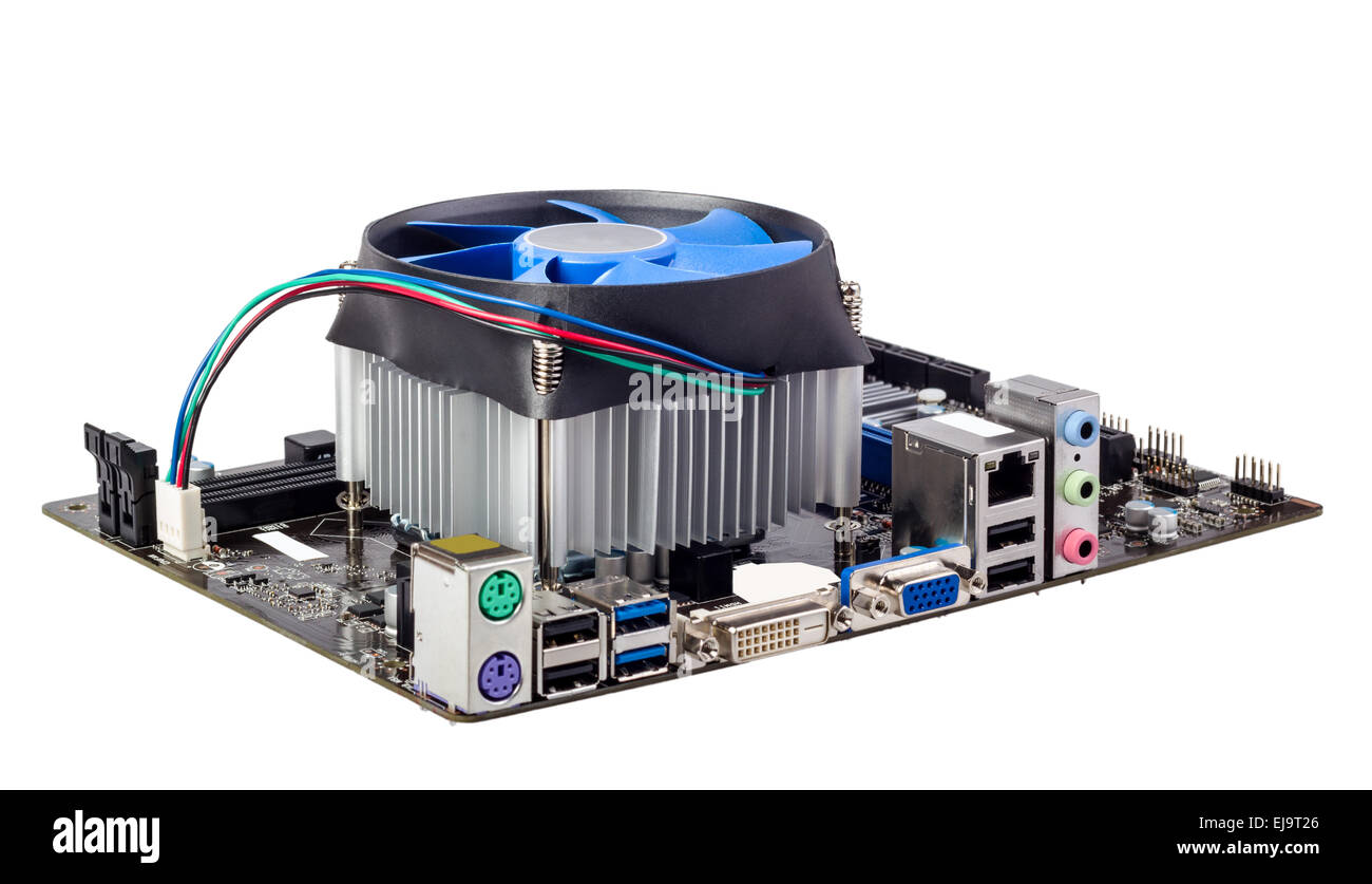 Computer motherboard with CPU cooler isolated Stock Photo - Alamy