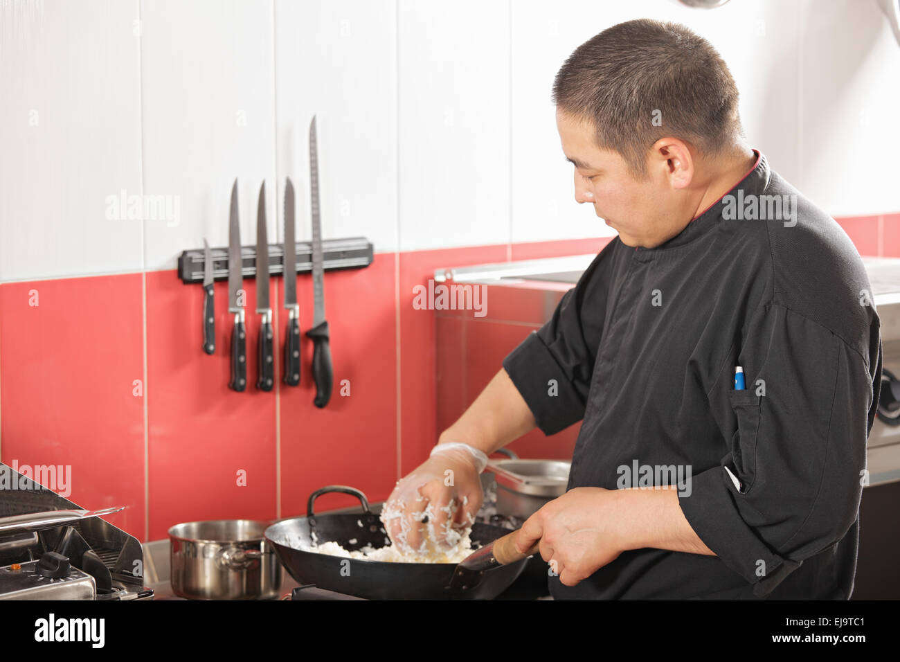 Chef frying rice hi-res stock photography and images - Alamy