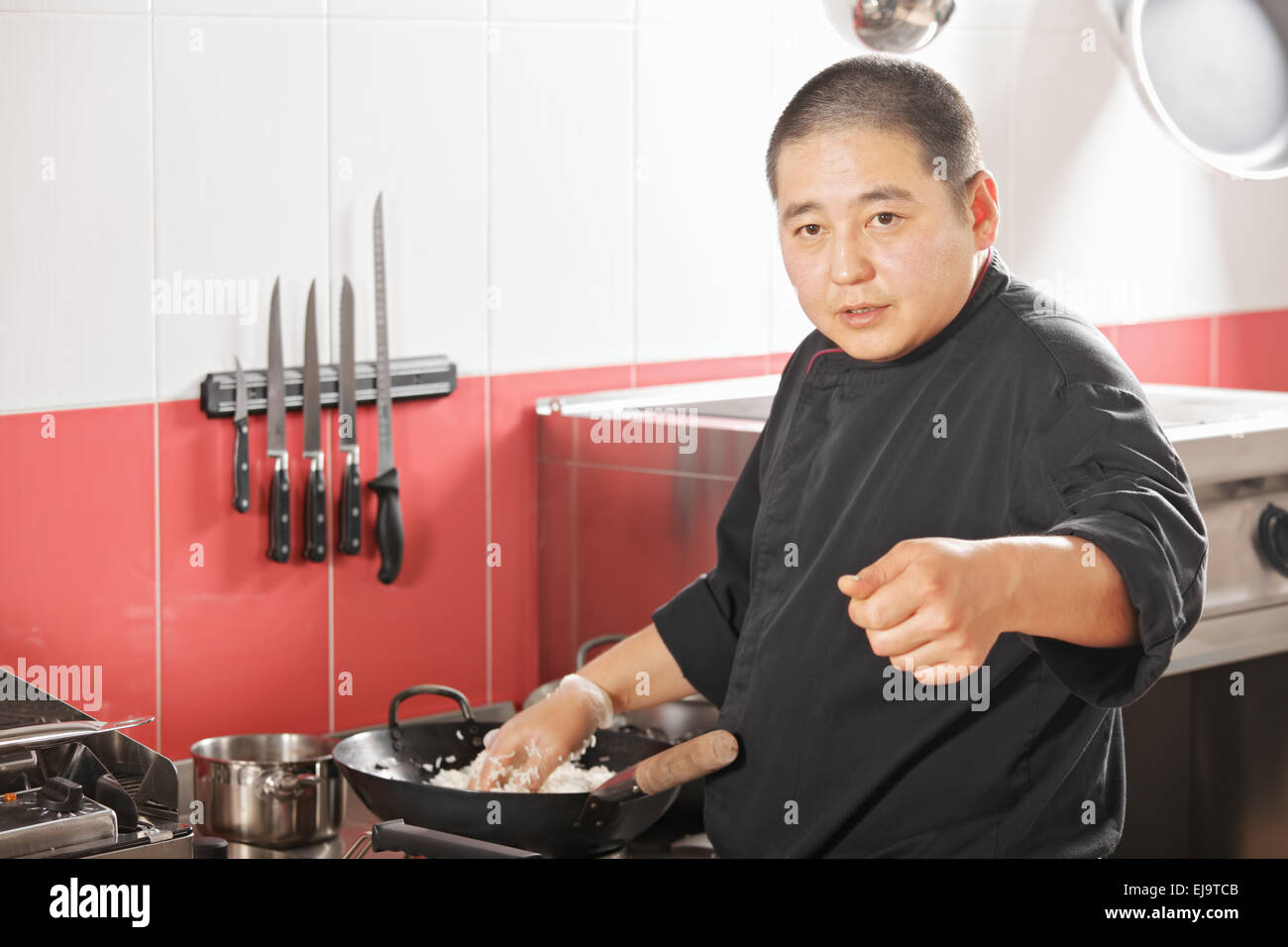 Chef preparing rice Stock Photo - Alamy