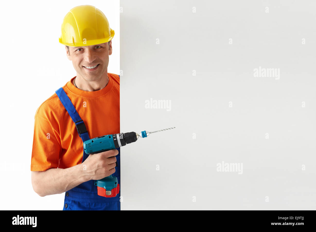 Man with a drill Stock Photo - Alamy