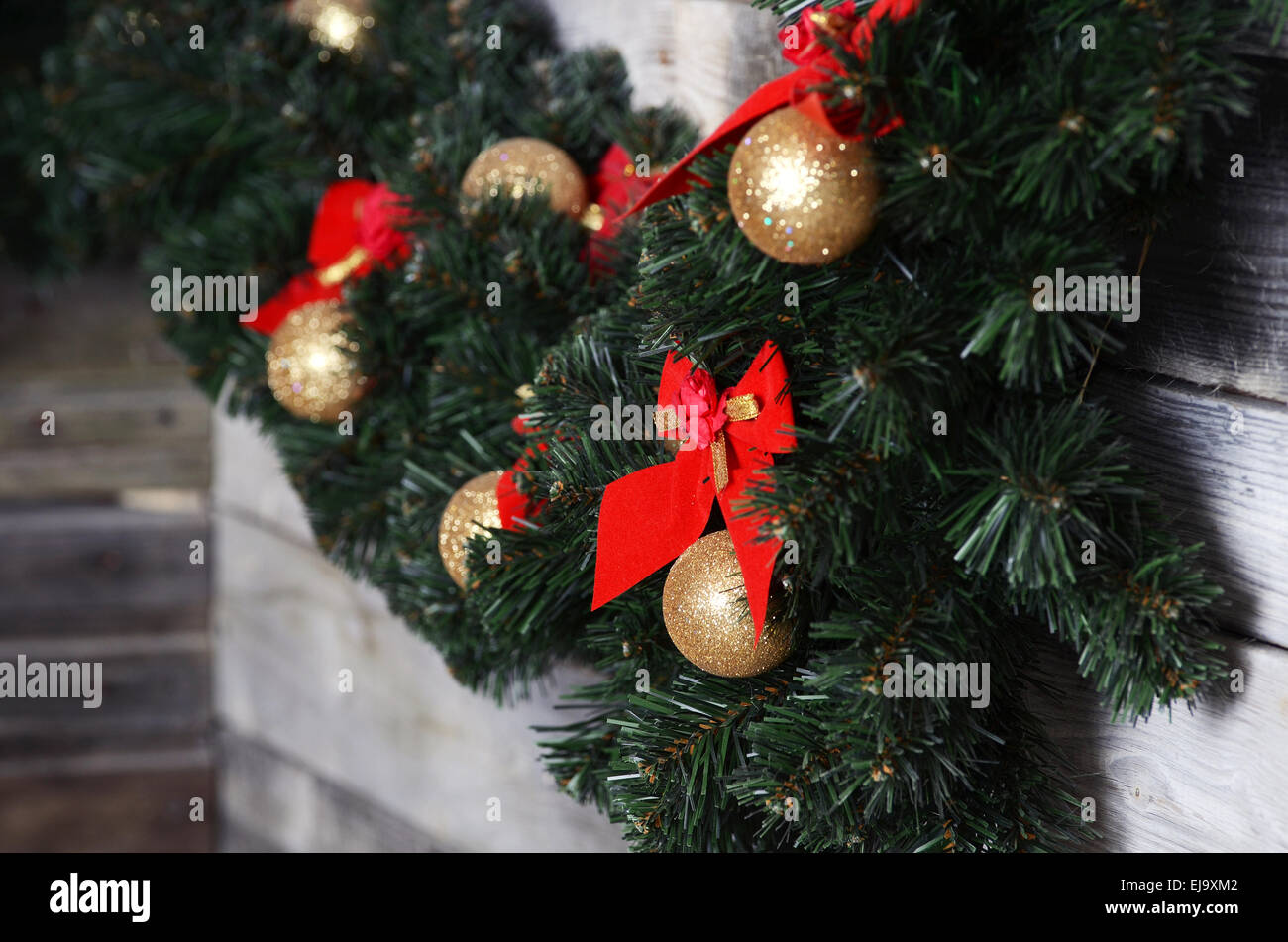 Christmas branch of a fur-tree on a wall Stock Photo - Alamy