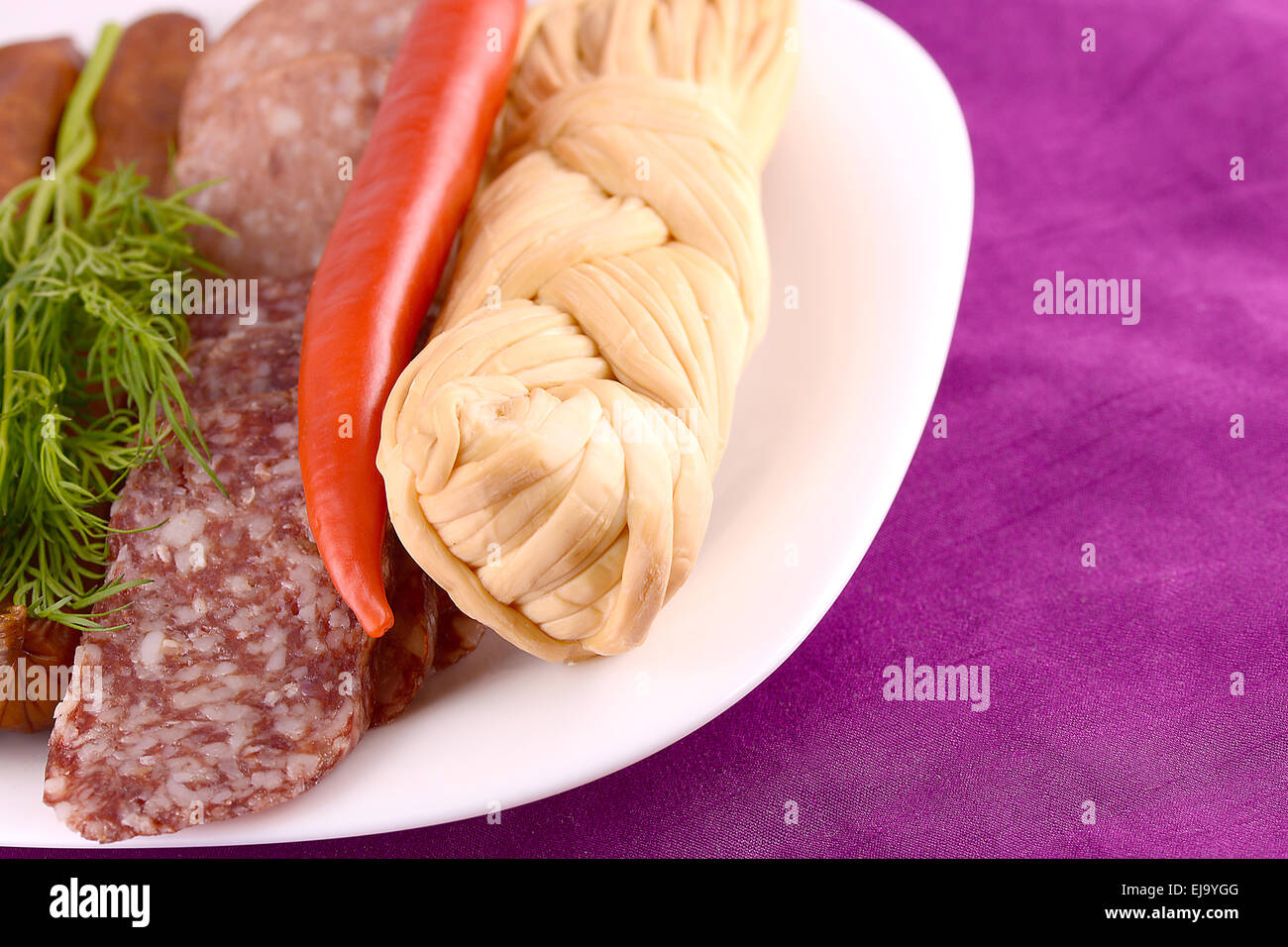 salami with pieces of cheese and red pepper Stock Photo - Alamy