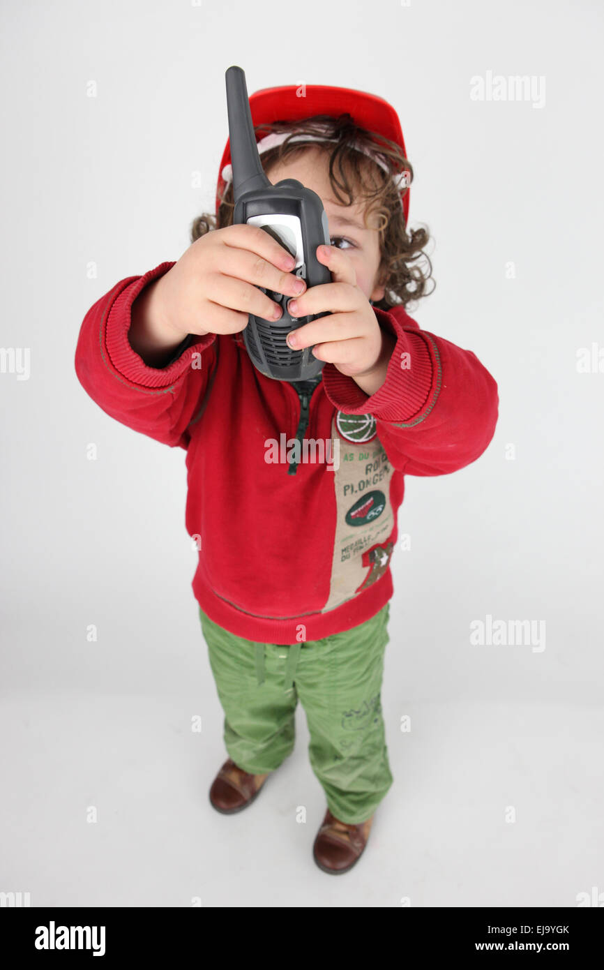 Little boy holding radio-receiver Stock Photo - Alamy