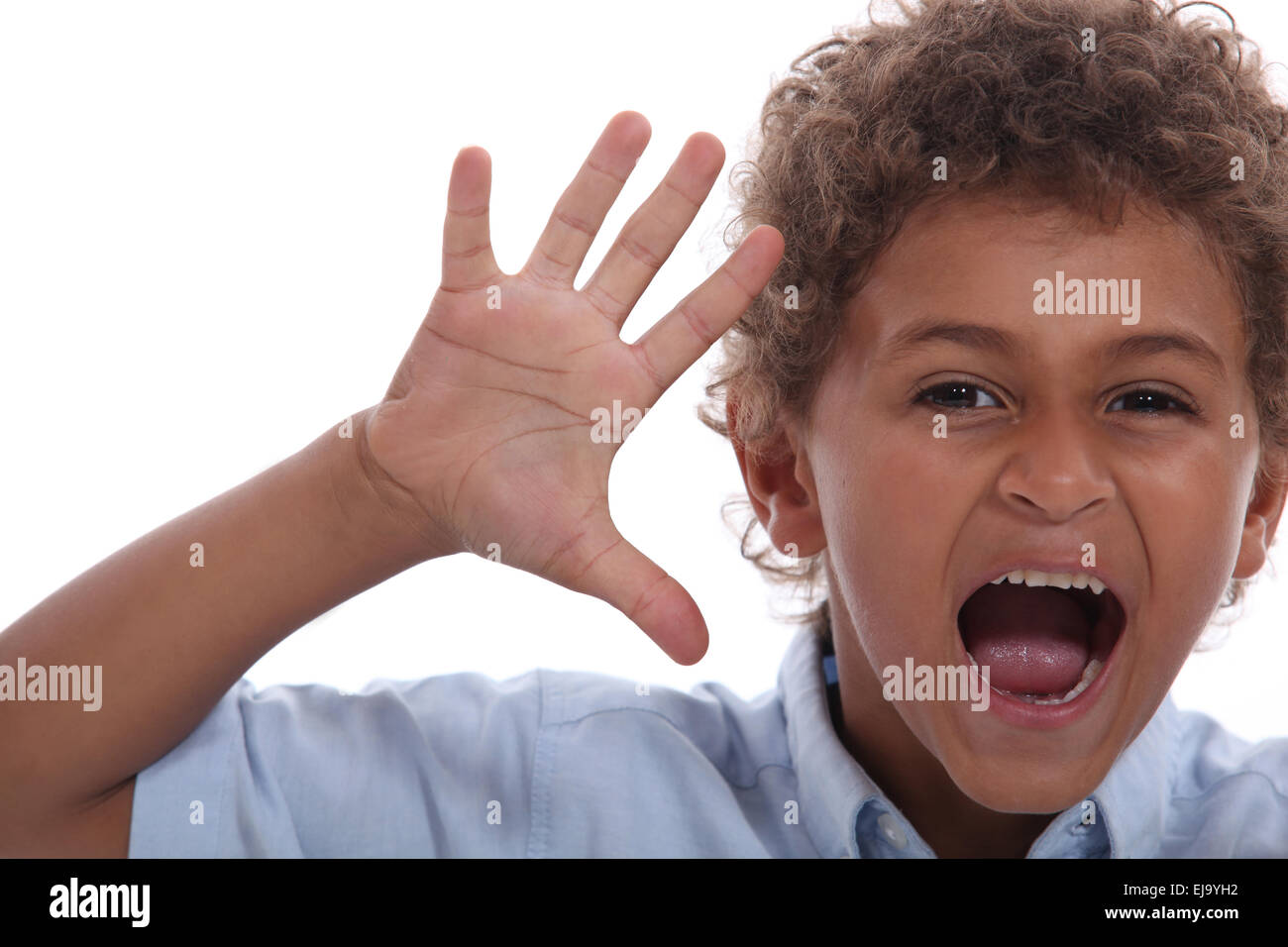 Little boy with raised hand Stock Photo - Alamy