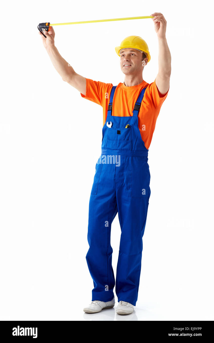 Caucasian man architect builder measure hi-res stock photography and ...