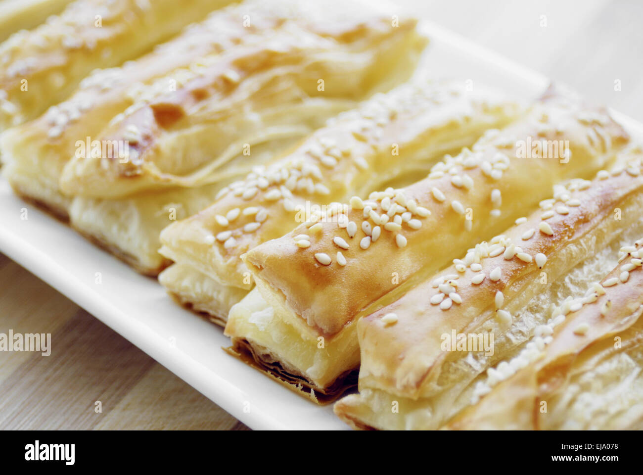 Just baked crunchy puff pastry Stock Photo - Alamy