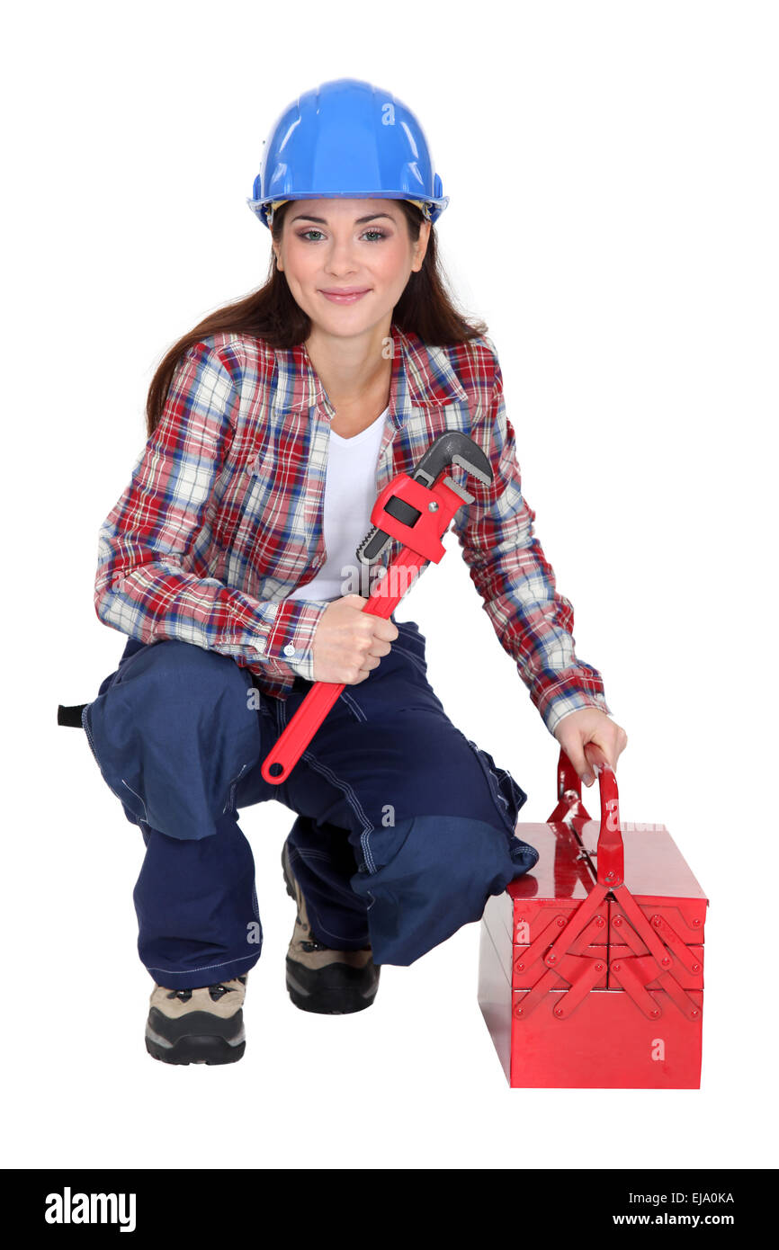 Woman with an adjustable wrench Stock Photo - Alamy