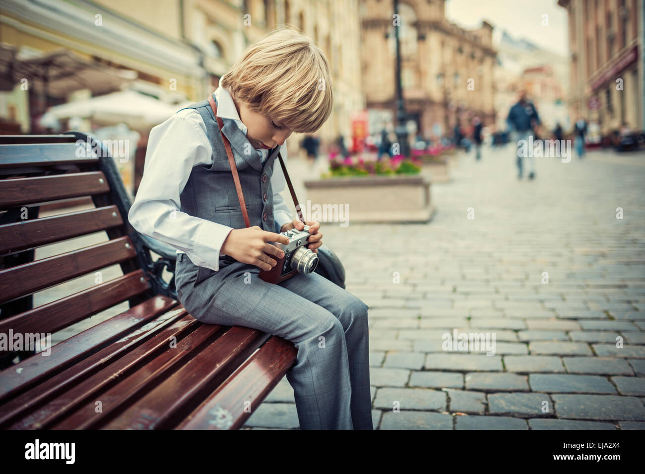 Boy with a camera Stock Photo - Alamy
