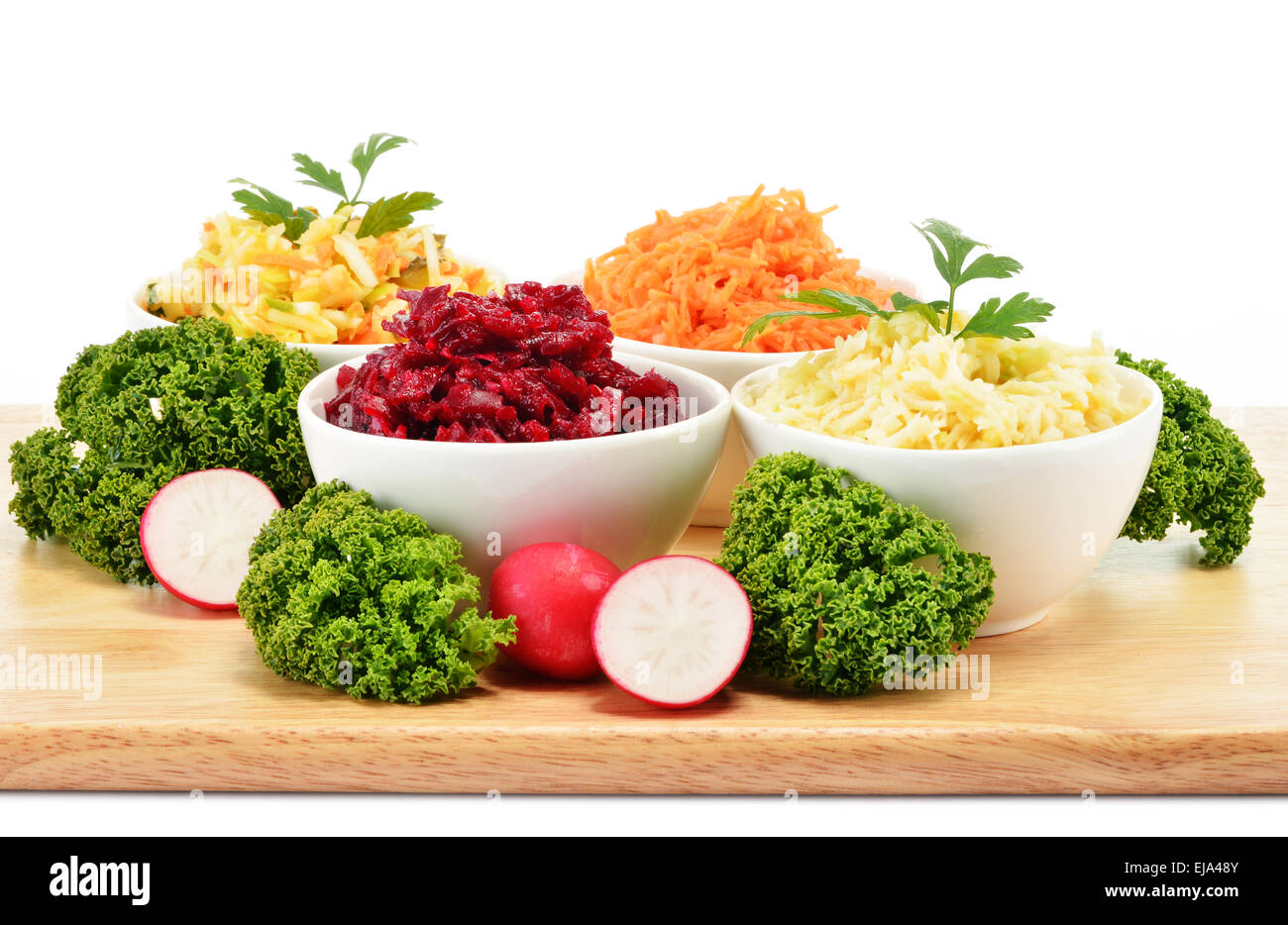 Composition with four vegetable salad bowls Stock Photo - Alamy