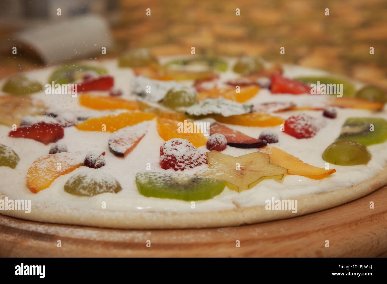 sweet pizza with fruit. Italian food Stock Photo - Alamy