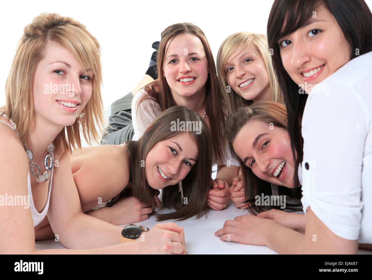 Six young woman in studio white background Stock Photo - Alamy