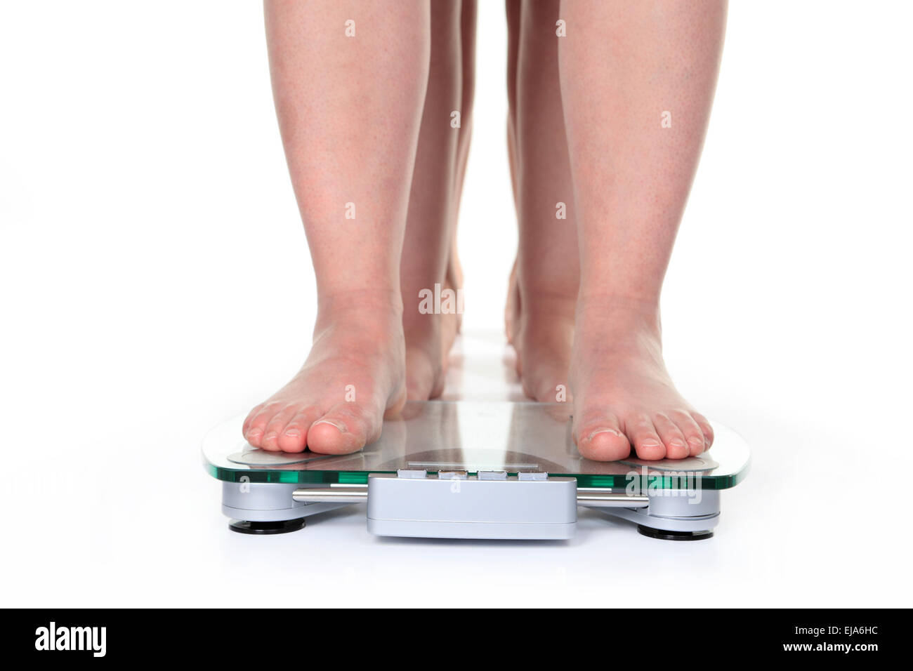 A Weight problem among womens in studio white background Stock Photo ...