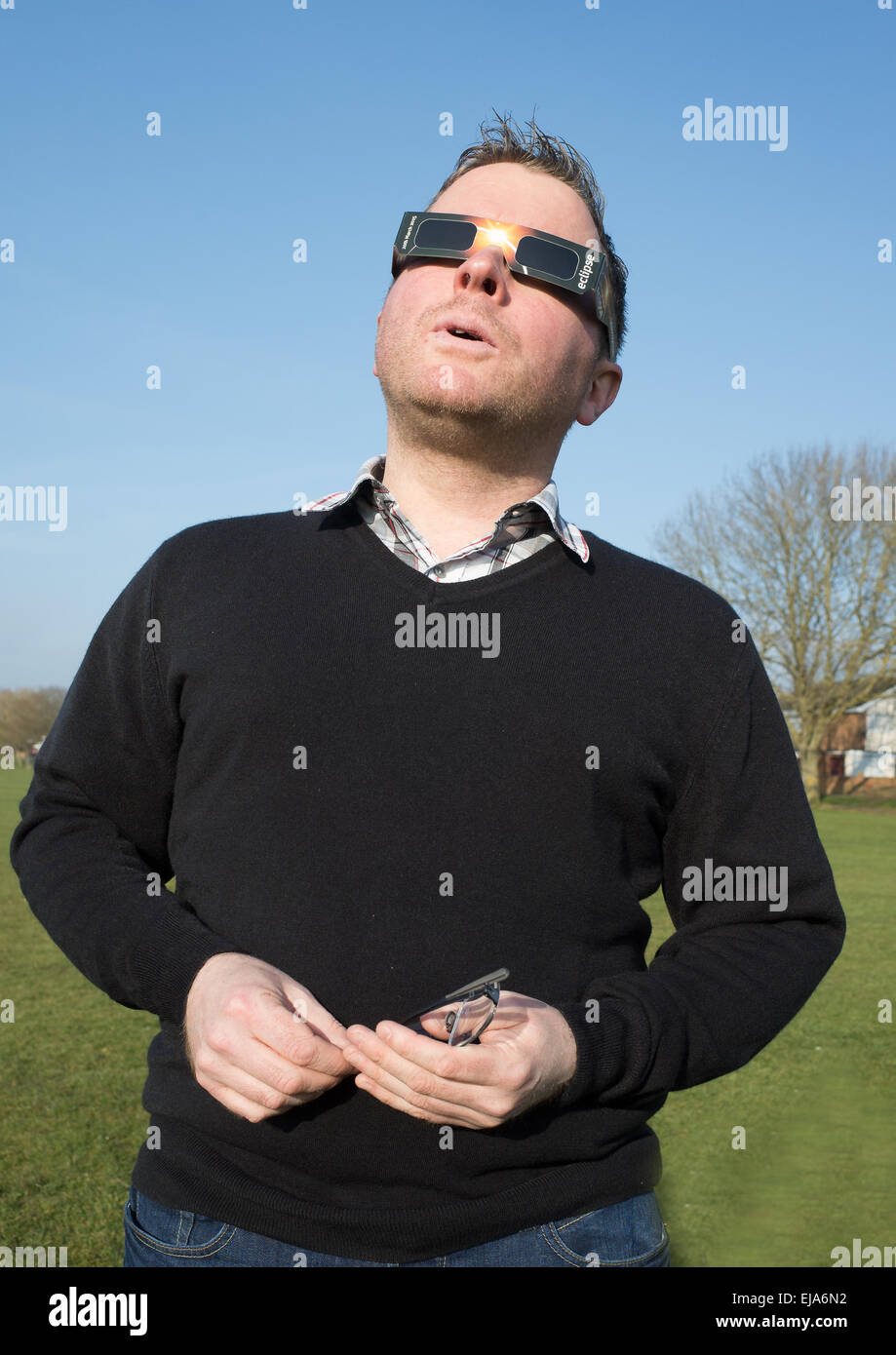 Man stares at the solar eclipse on 20 march 2015 Stock Photo - Alamy
