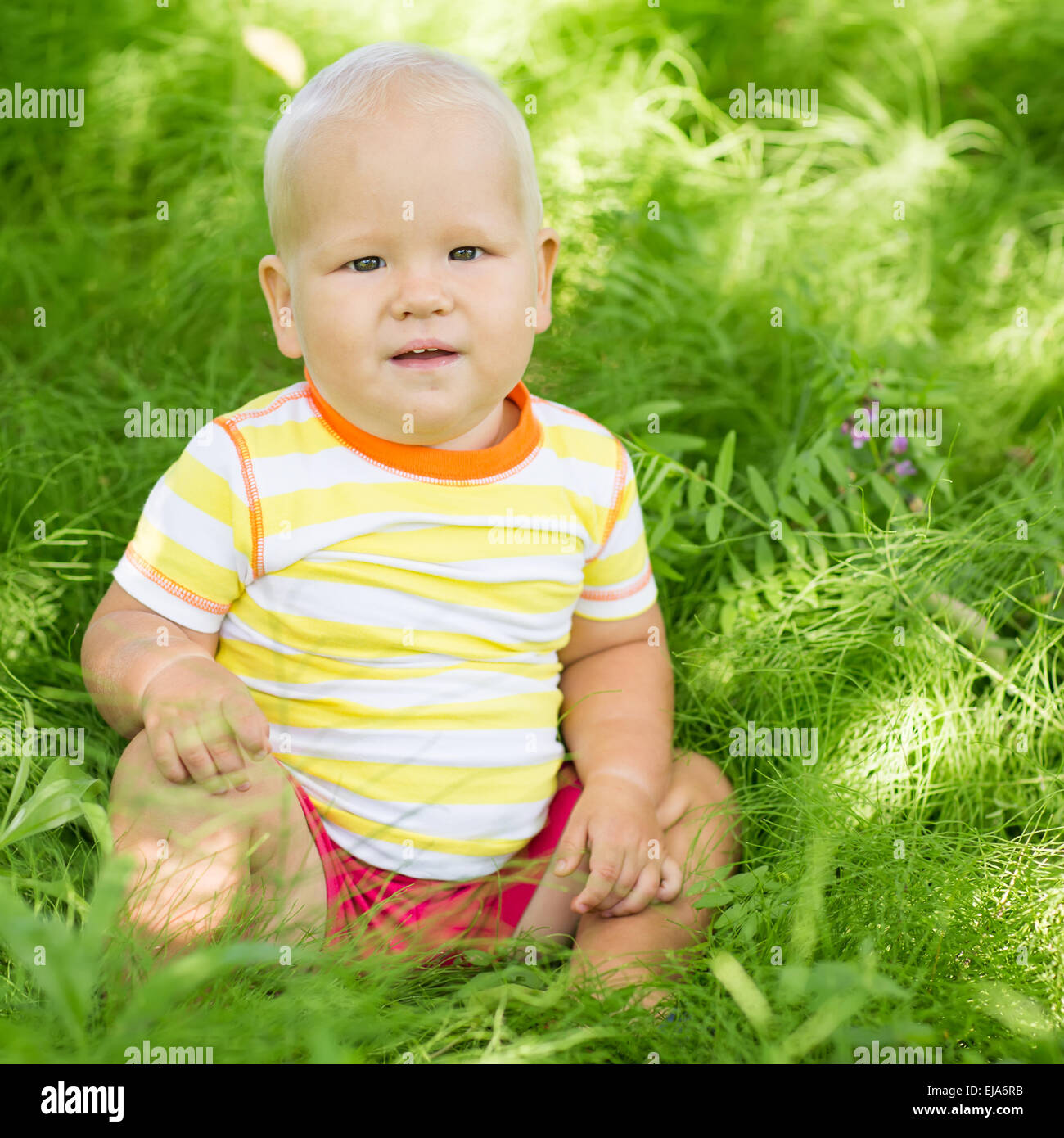 Closeup portrait of adorable baby boy with blue eyes on white ...