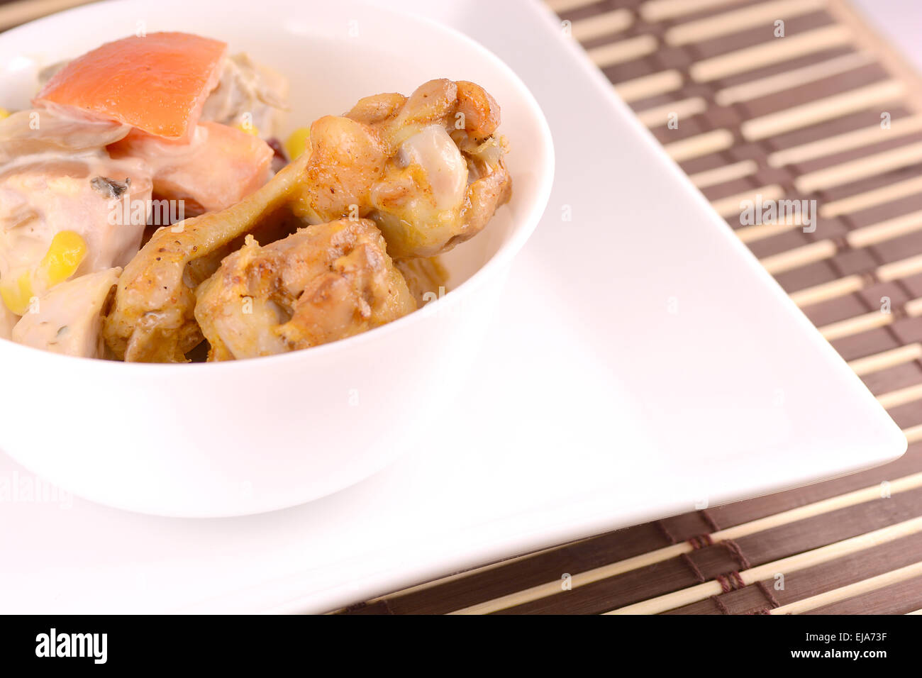 single Roasted chicken leg isolated on white Stock Photo - Alamy