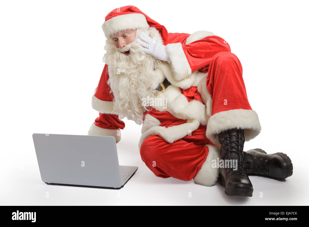 Santa searching for presents in the www Stock Photo - Alamy