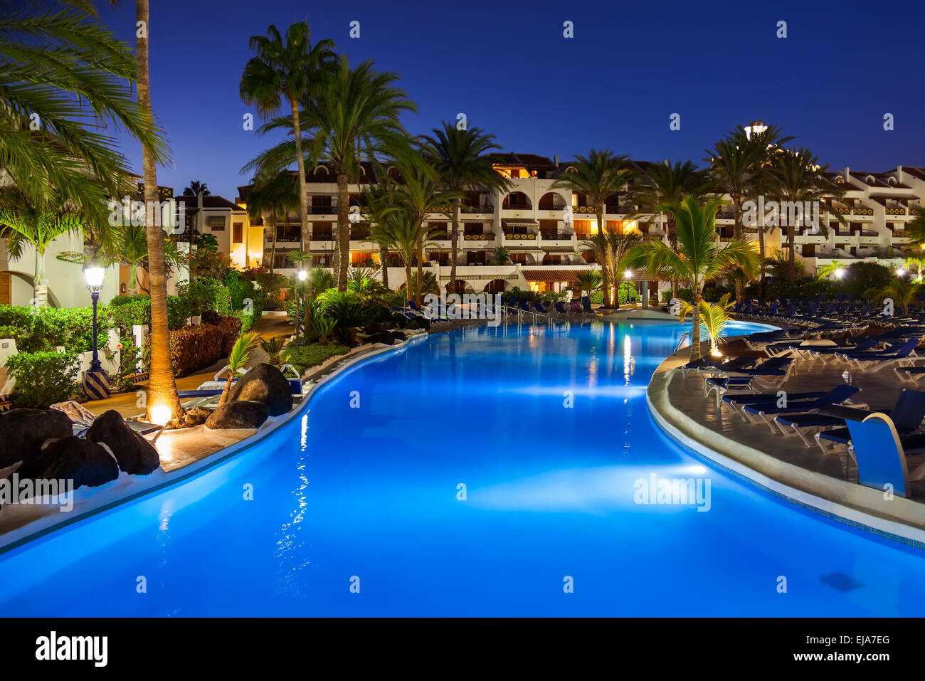 Blue swimming pool at night hi-res stock photography and images - Alamy