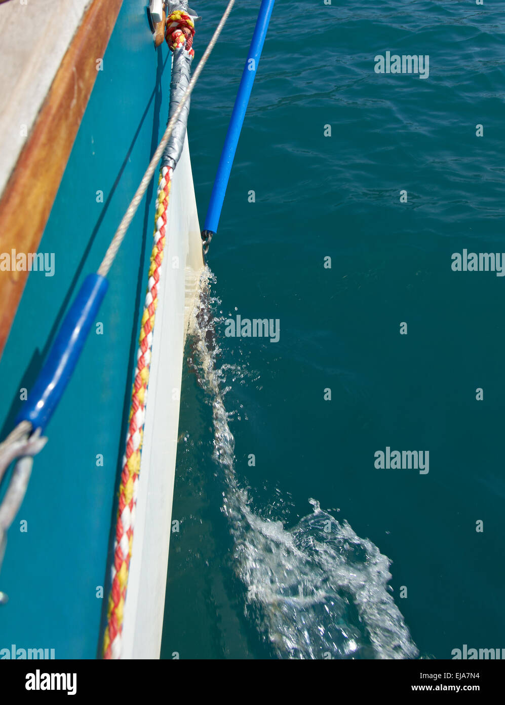 Water wake behind yacht Stock Photo - Alamy
