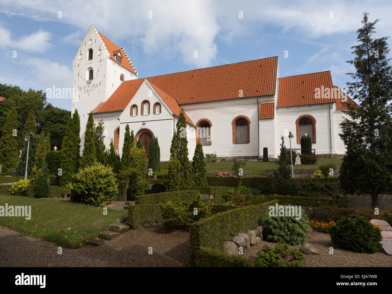 Cemetery with church Stock Photo - Alamy