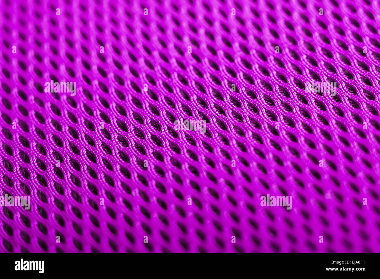 magenta background. Mesh fabric texture. Macro perspective Stock Photo ...