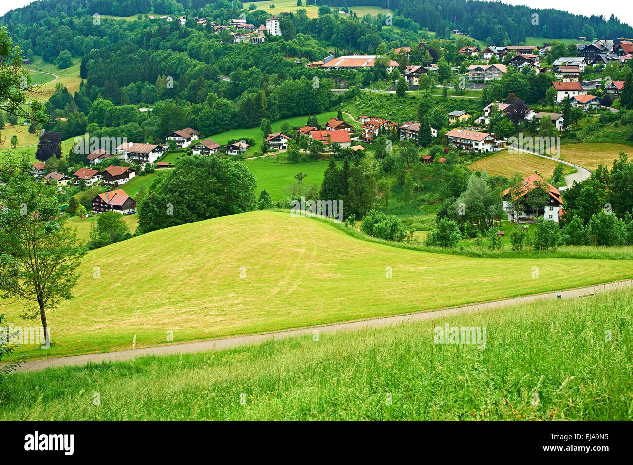 Bavarian landscape at Alps with village Stock Photo - Alamy