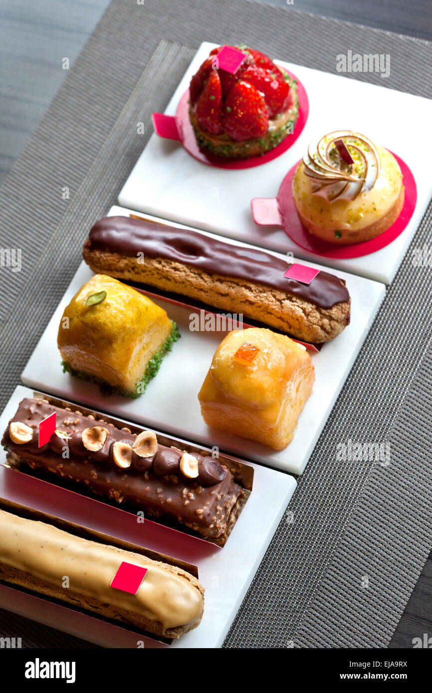 Various pastries on a plate in a tea-room Stock Photo - Alamy