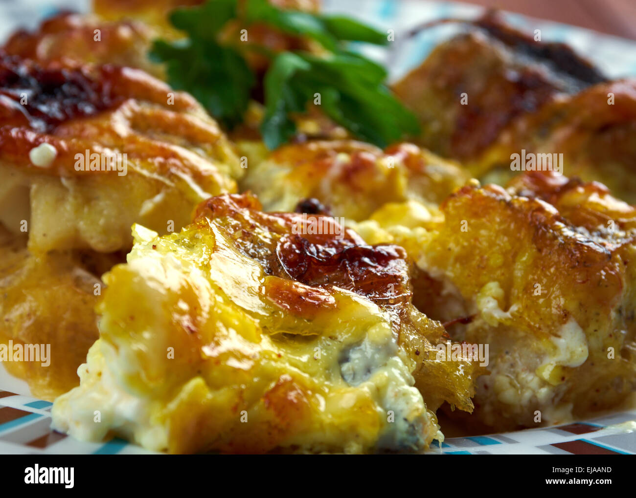 Fish dish - roasted fish Stock Photo - Alamy