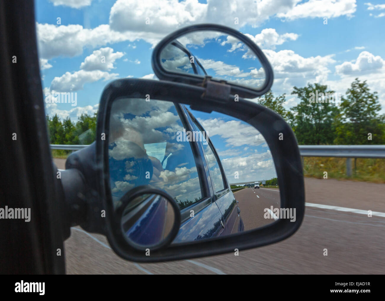 Reflection of sky with clouds in mirror Stock Photo - Alamy