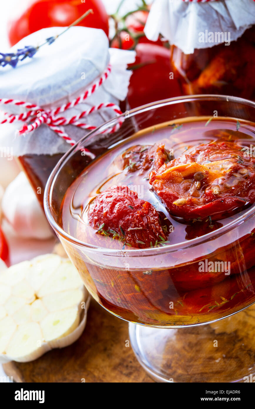Dried tomatoes in olive oil Stock Photo - Alamy