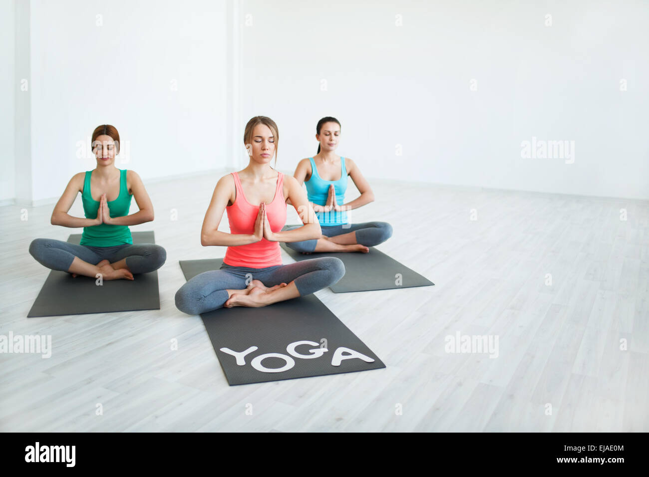 In yoga pose Stock Photo - Alamy