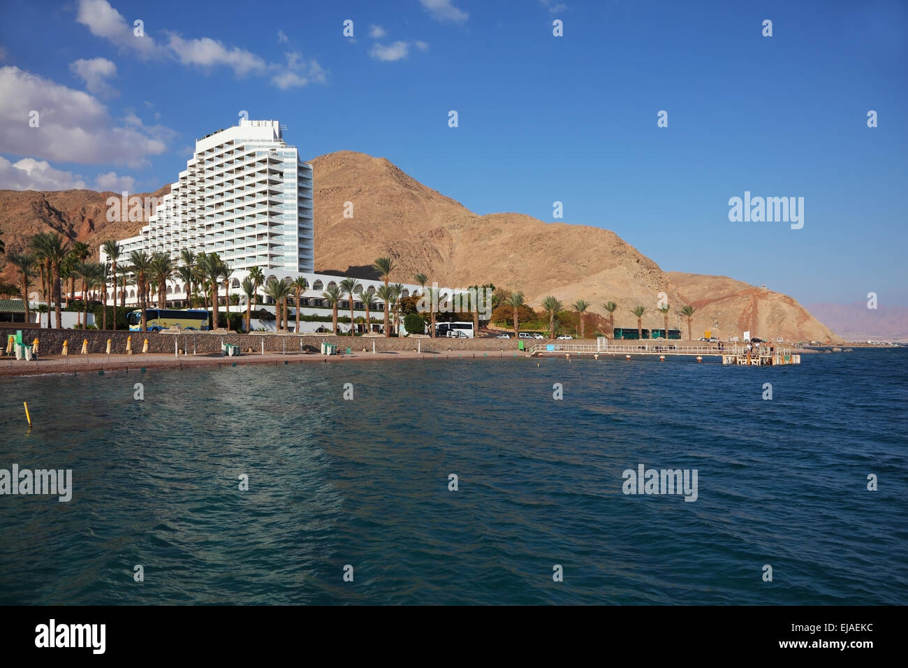 Magnificent hotel, palm trees and mountains Stock Photo - Alamy
